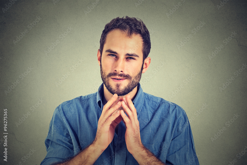 Sneaky scheming young man, worker trying to plot something Stock Photo ...