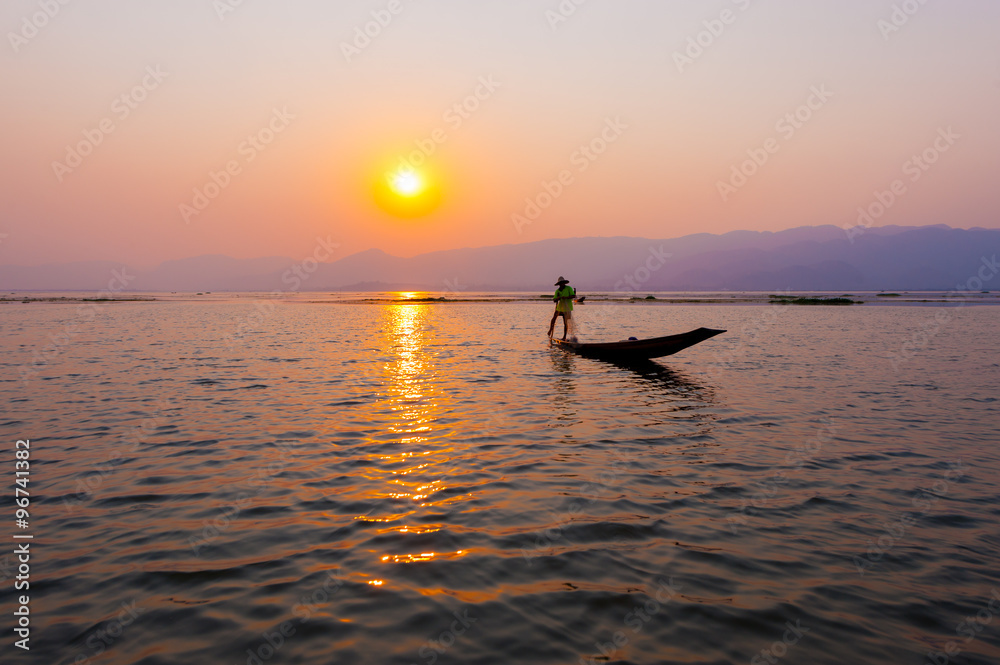 INLE LAKE VILLAGE MYANMAR : Silhouette People rows the wooden boat by ...