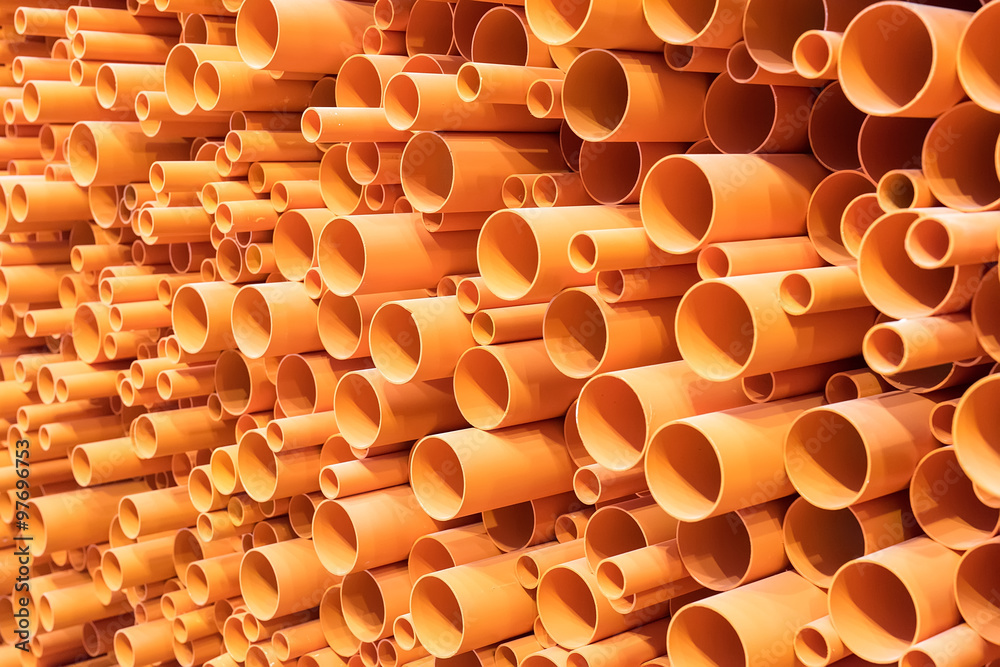 PVC pipes stacked in construction site Stock Photo | Adobe Stock
