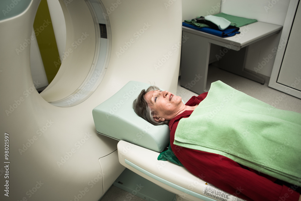 Computer tomography scan.Old woman patient at computerized axial ...