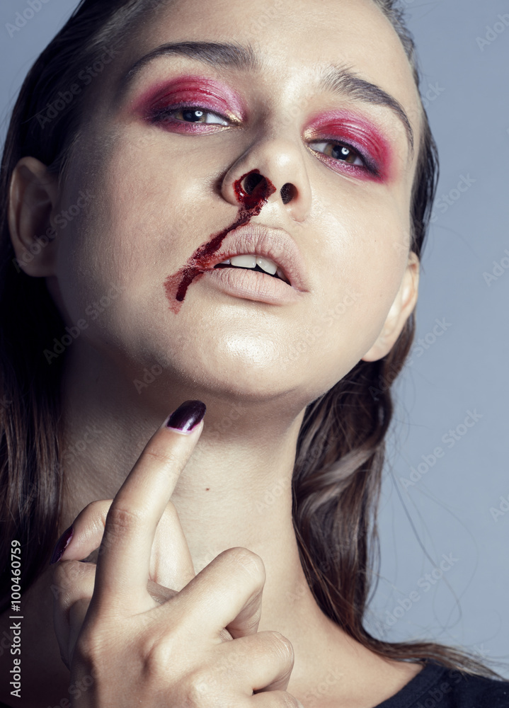 problem depressioned teenager with bleeding nose, real junky close up ...