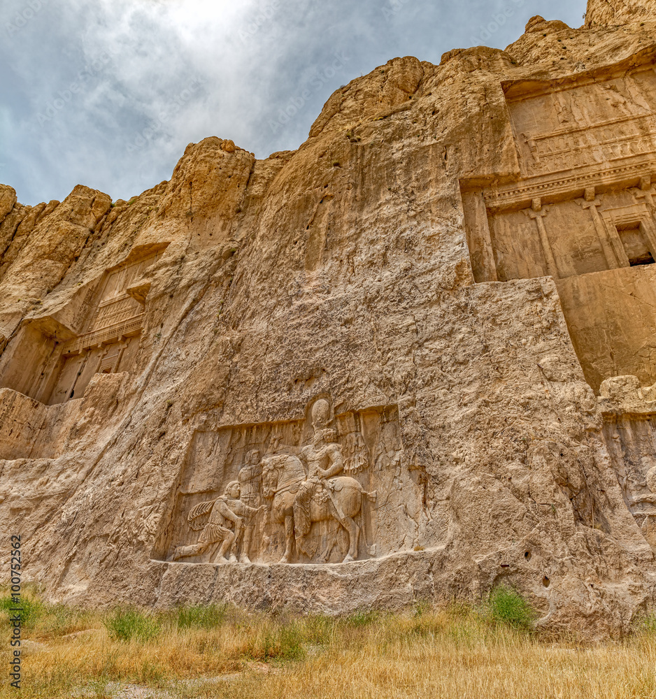 Ancient relief of the necropolis Naqsh-e Rustam that shows the triumph ...