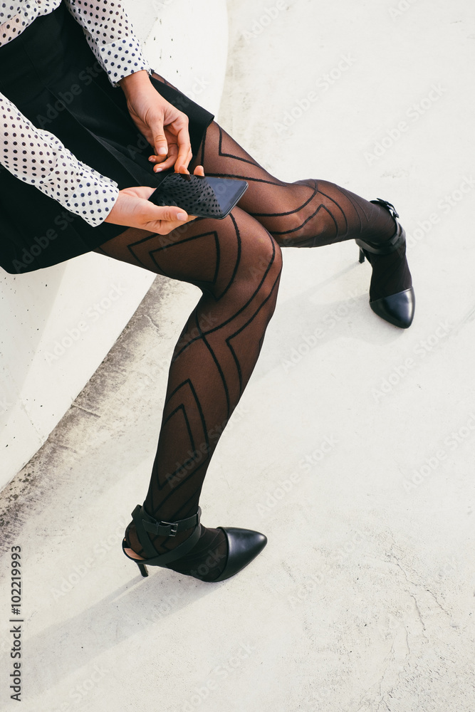 Modern professional woman taking a job rest for texting on her ...