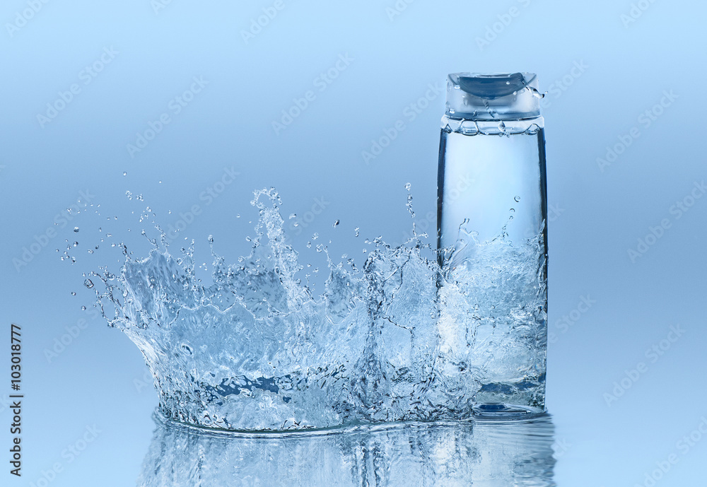 Moisturizing shampoo on the blue water background with big splash ...