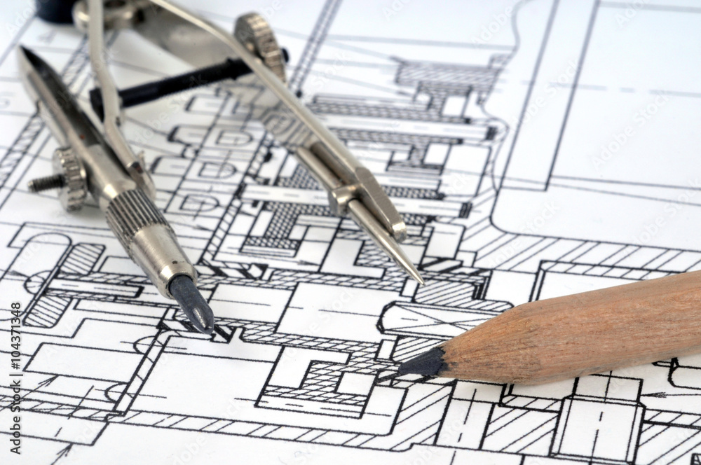 Compas et crayon posés sur un dessin industriel Stock Photo | Adobe Stock