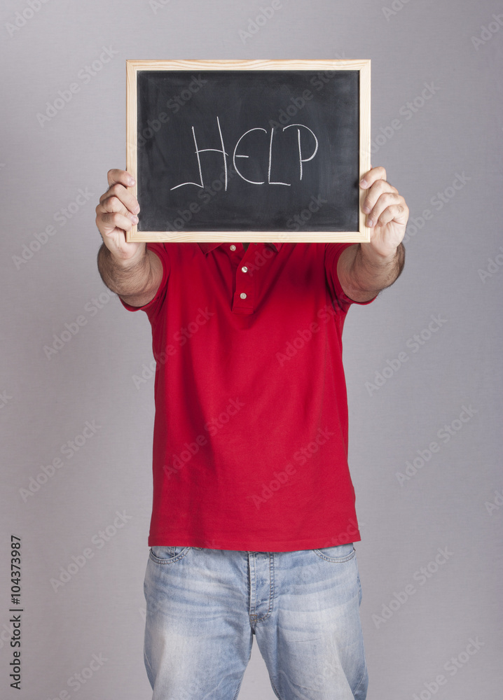 Stock-Foto „Man holding a help sign“ | Adobe Stock
