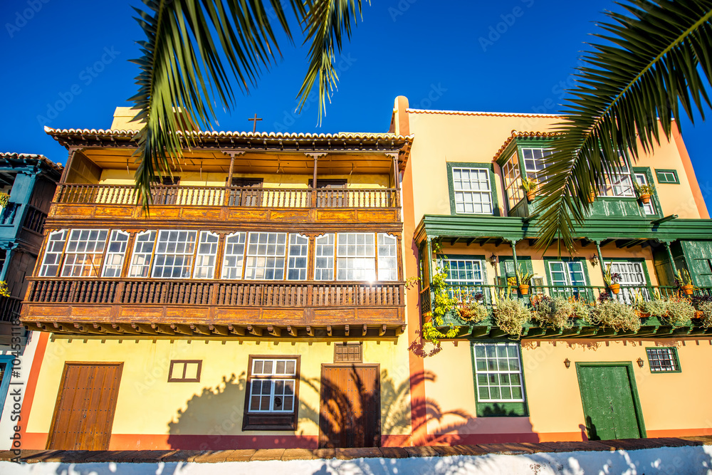 Famous ancient colorful balconies decorated with flowers in Santa Cruz ...