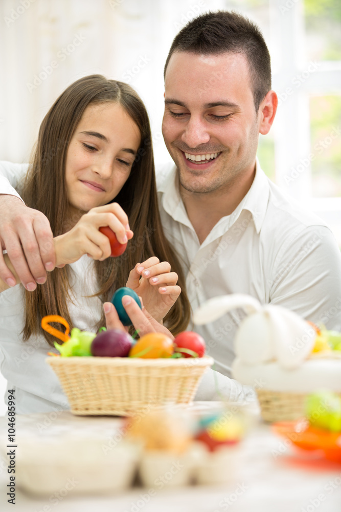 father and daughter playful with Easter eggs Stock Photo | Adobe Stock