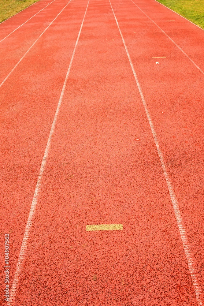 Yellow marks. White lines and texture of running racetrack, red ...