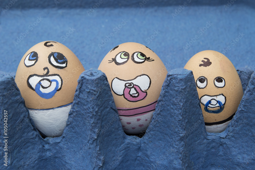 Three baby egg face Stock Photo | Adobe Stock