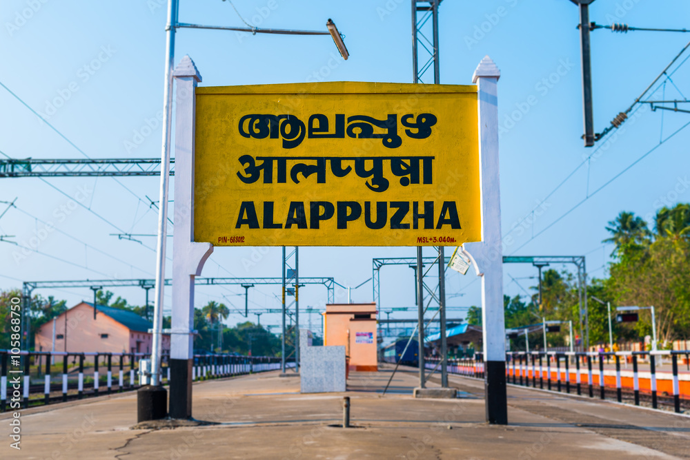 Railroad sign "Alappuzha" (Alleppey) written in Malayalam (official ...