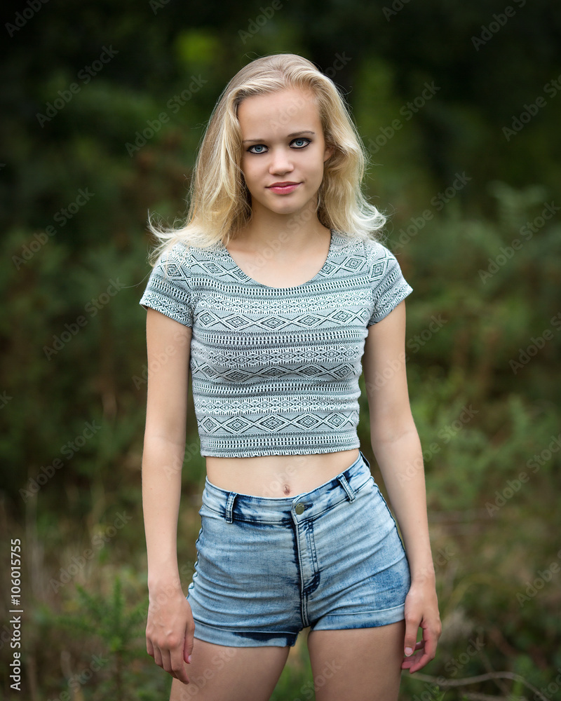 Beautiful Blond Teen Showing Belly Button Stock Photo | Adobe Stock