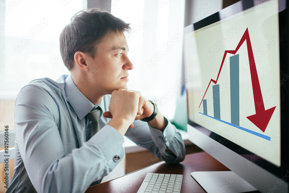 Frustrated stressed shocked business man with financial market chart ...
