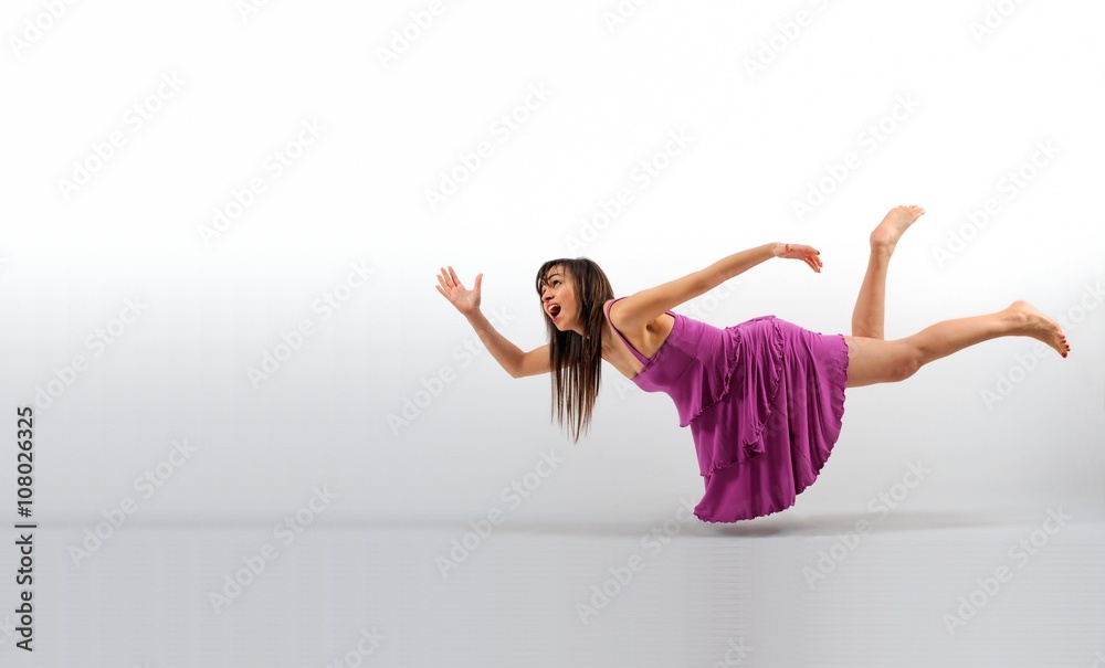 Woman fly - levitation with pink dress isolated white background Stock ...