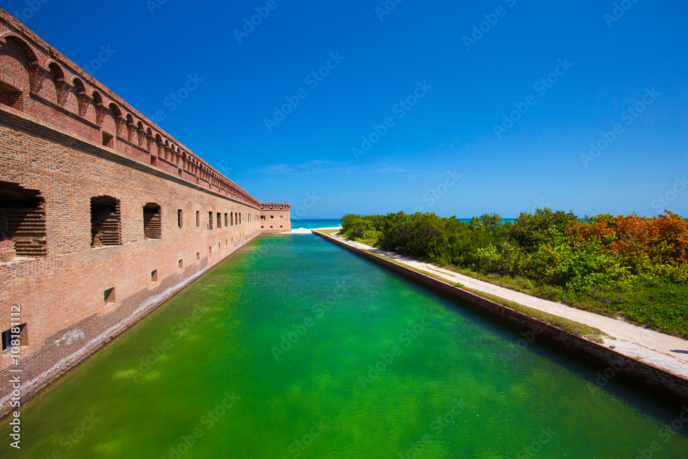 Standing on the moat which surrounds Fort Jefferson Civil War Fort and ...