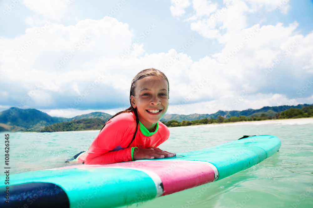 Kid surfing Stock Photo | Adobe Stock