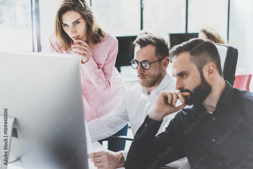 Foto de Stock Coworkers in sunny office.Project managers team work new ...