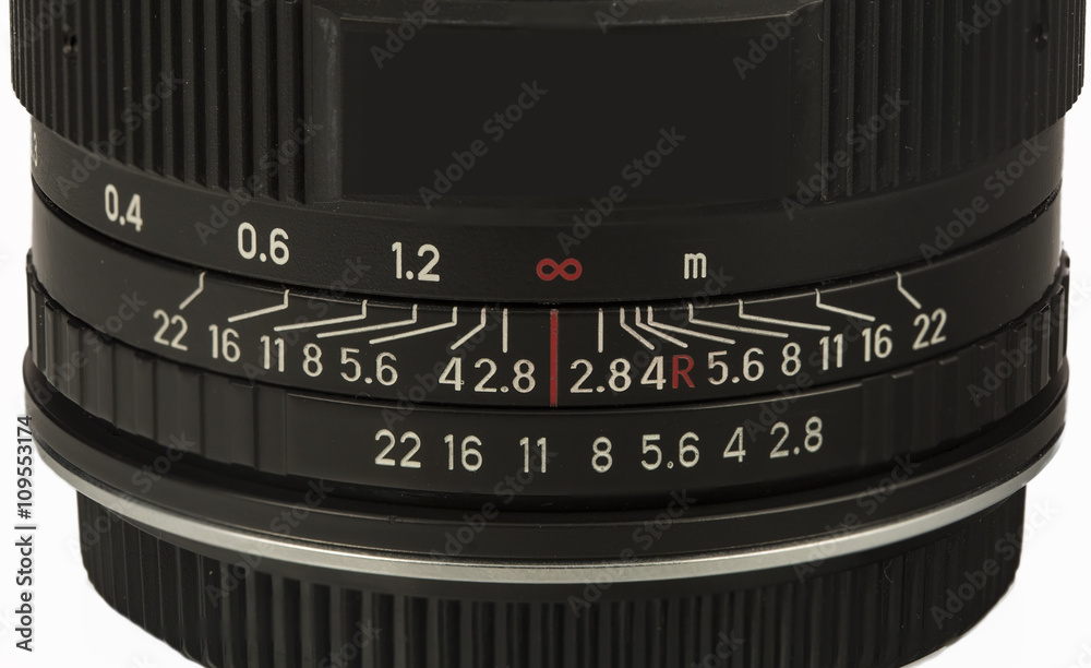 Lens aperture and focusing scale on white Stock Photo | Adobe Stock