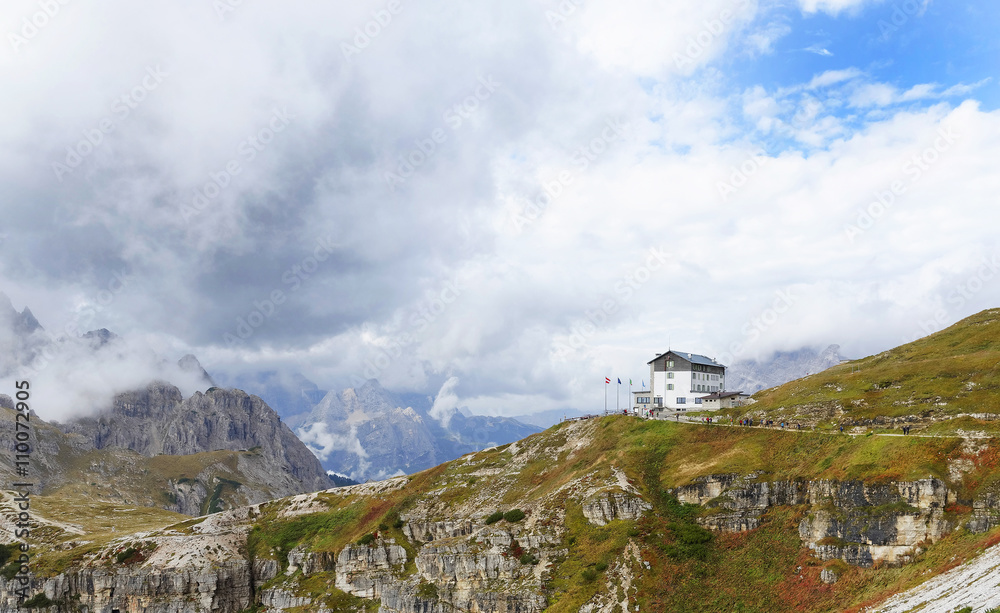 Dolomites mountains landscape with the hut Refugio Auronzo, near Tre ...