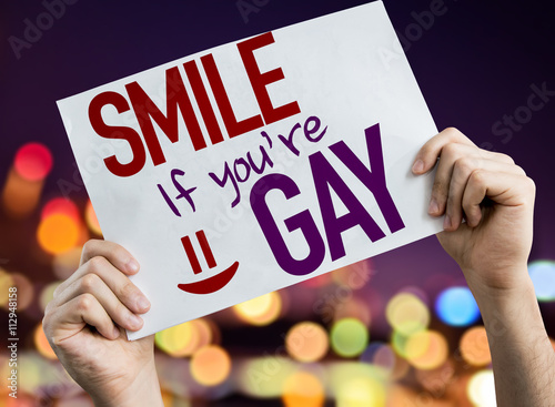 Smile If You're Gay placard with night lights on background Stock-Foto ...