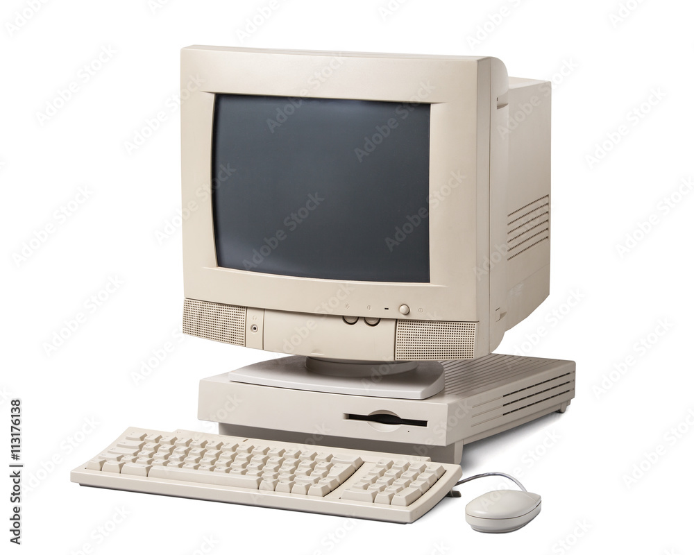 Old personal computer. The system unit, CRT monitor, keyboard and mouse ...