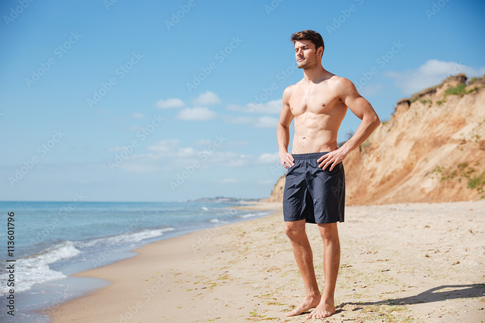 Person Standing On The Beach