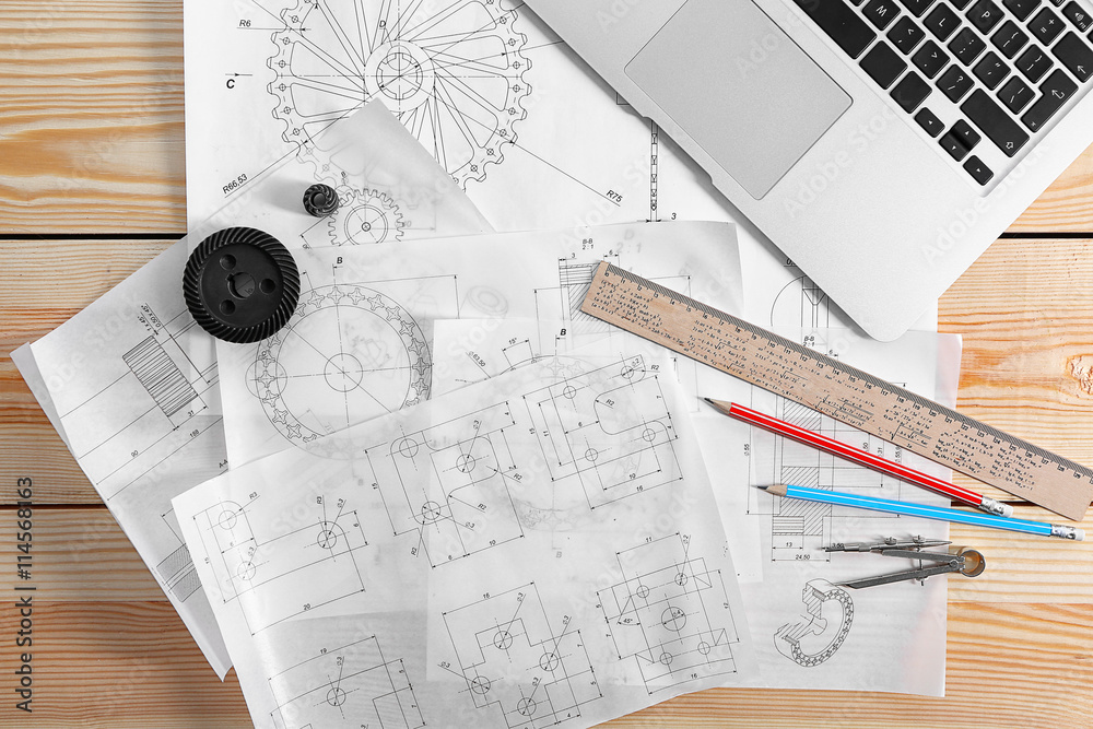 Engineering drawings of parts with tools and laptop Stock Photo | Adobe ...