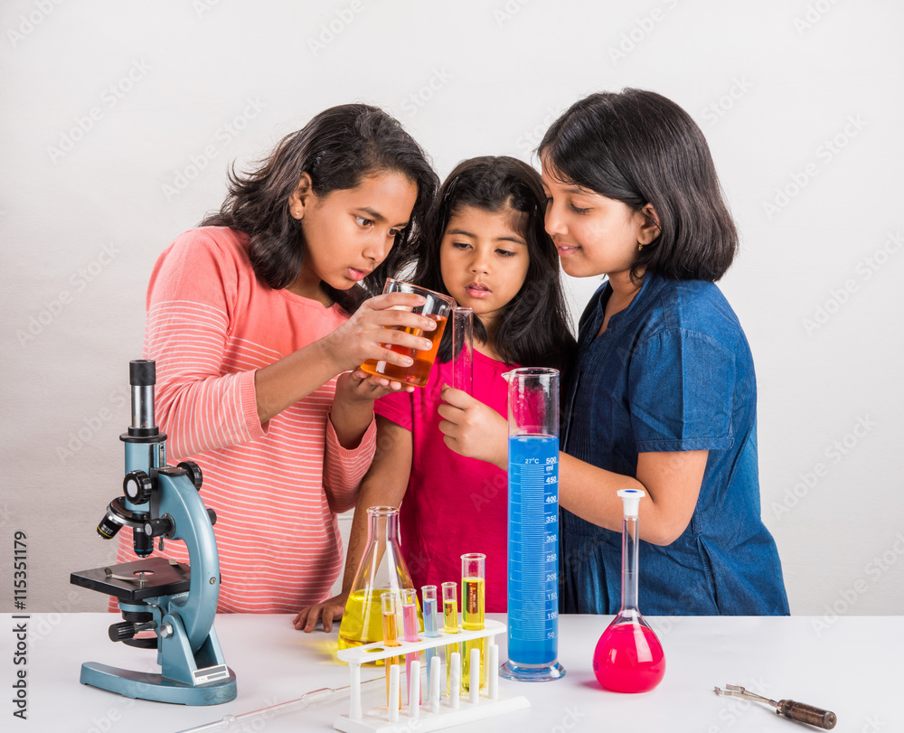 3 indian little girls or indian students and science experiments ...