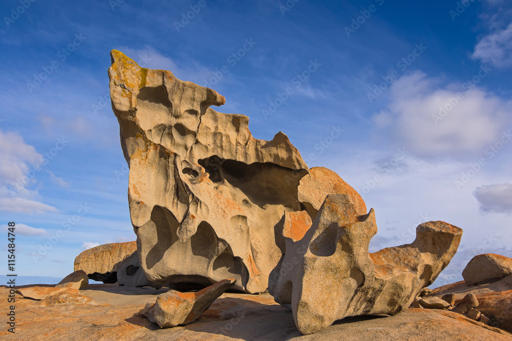 Remarkable Rocks, natural rock formation covered by golden orange ...
