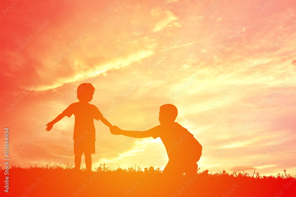 Silhouette children playing on sunset Stock Photo | Adobe Stock