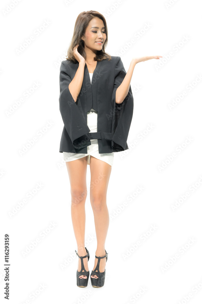Beautiful Young Asian Businesswomen smiling happy presenting with open hand showing empty copy ...