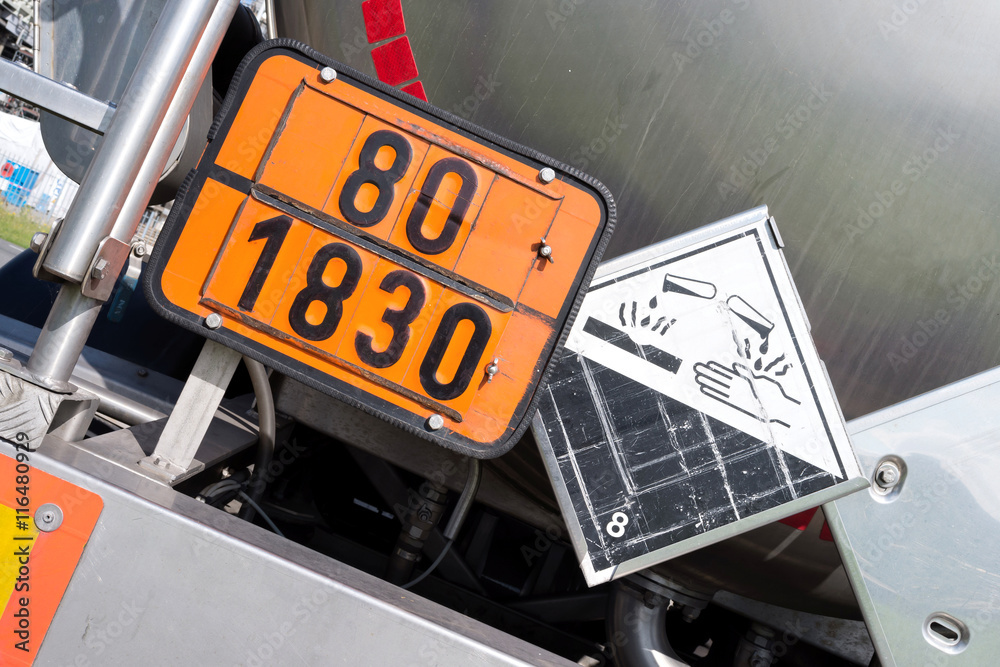 orange-colored plate with hazard-identification number 80 and UN-Number ...