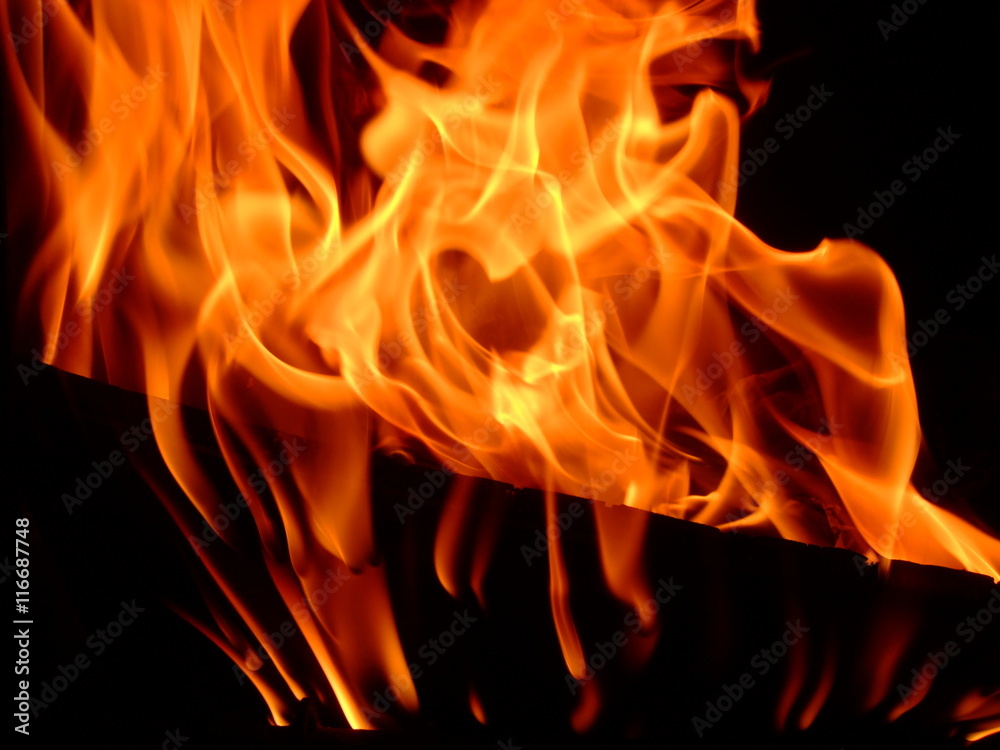 Stock-Foto „A nice fire in a fire place“ | Adobe Stock