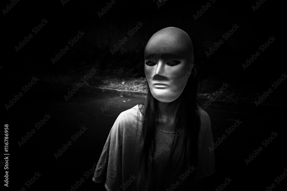 Dark doctrine,Mysterious woman wearing white mask,Scary background for ...