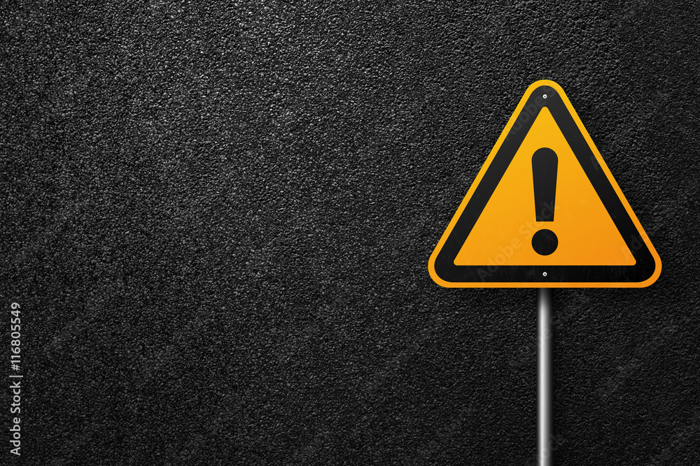 Road sign triangular shape with exclamation mark on a background of ...