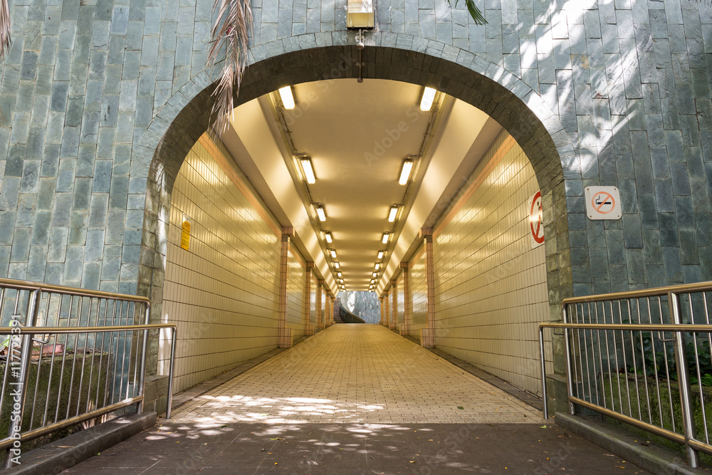 underground crossing at Fort Canning Park, Singapore. Tunnel way to the ...