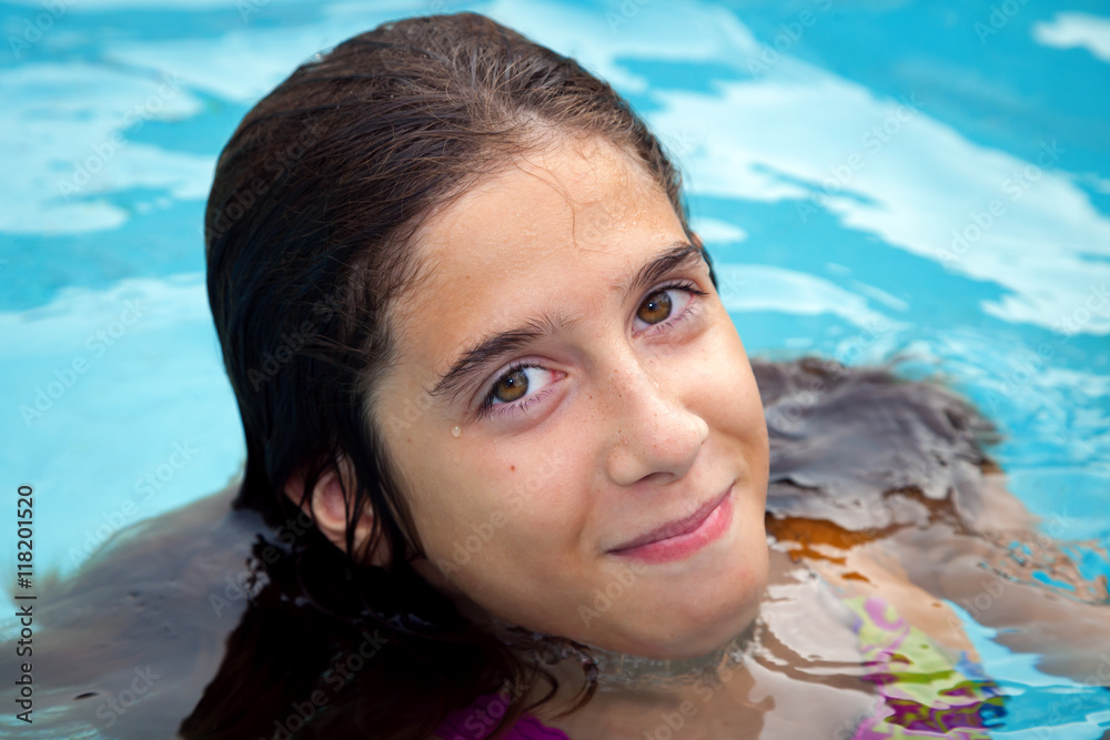 Confident Tween Girl In Swimming Pool Stock Photo | Adobe Stock