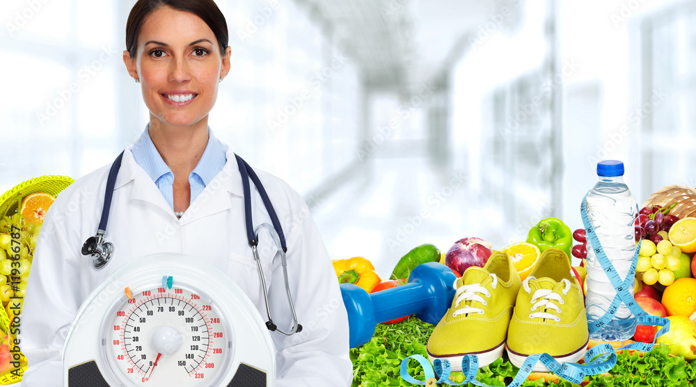 Stock-Foto „Doctor woman with scales.“ | Adobe Stock