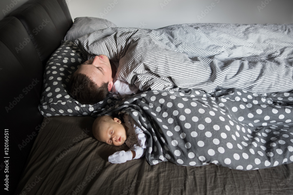 Newborn Baby boy sleep with his father Stock Photo | Adobe Stock