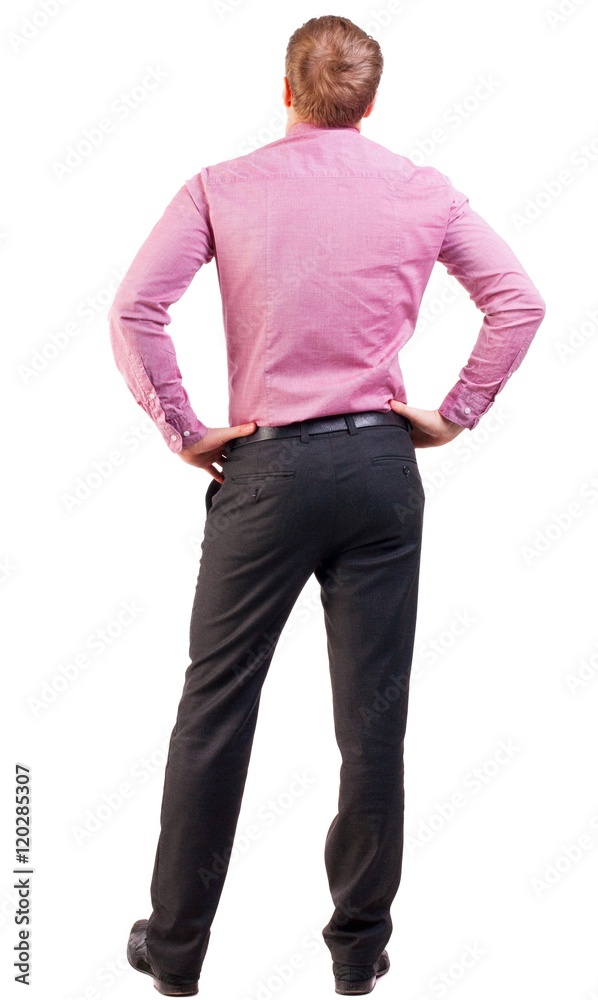 Stock-Foto „back view of Business man looks ahead. Young guy in pink ...