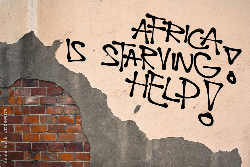Africa Is Starving, Help - handwritten graffiti sprayed on the wall ...