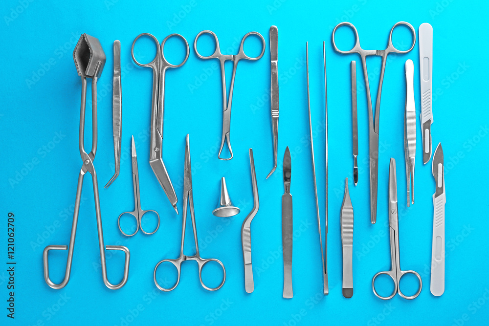 Flat lay of medical instruments on blue background Stock Photo | Adobe ...