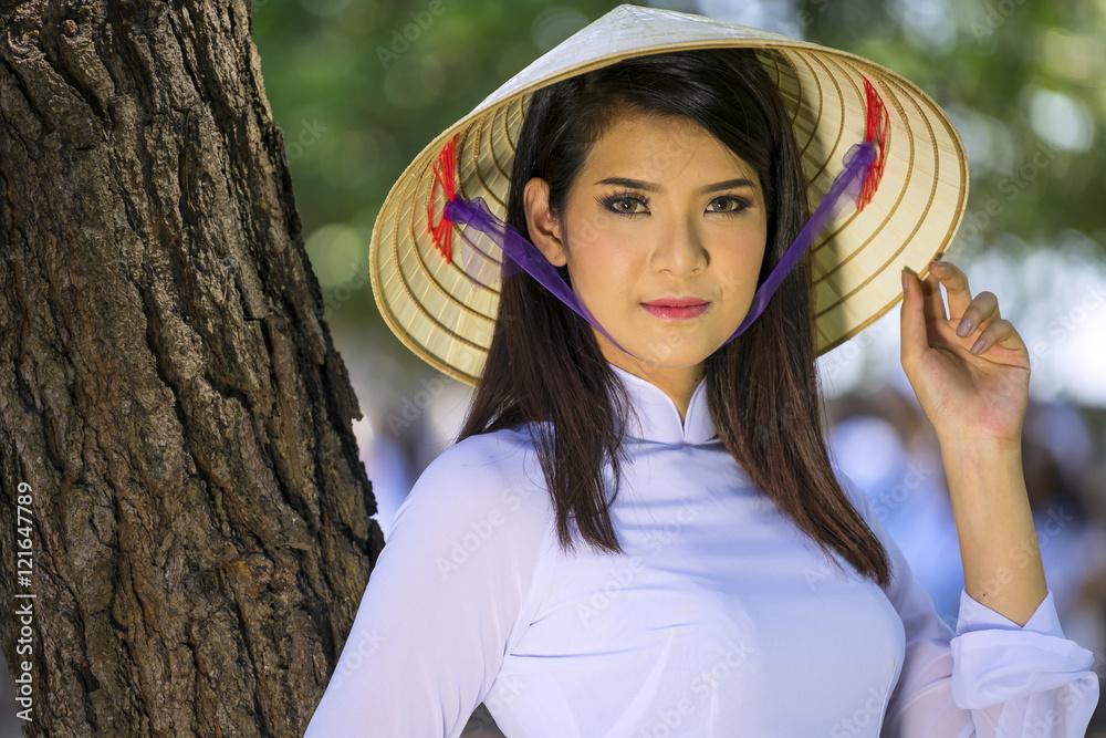 Beautiful woman with Vietnam culture traditional dress, Ao dai is ...