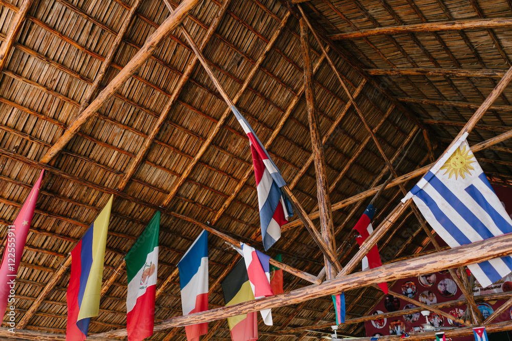 Flags of different countries under the ceiling Stock Photo | Adobe Stock