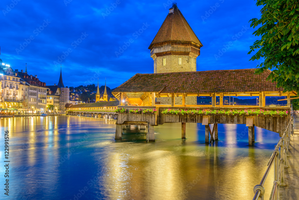 Night view towards Chapel Bridge (Kapellbruecke) together with the ...