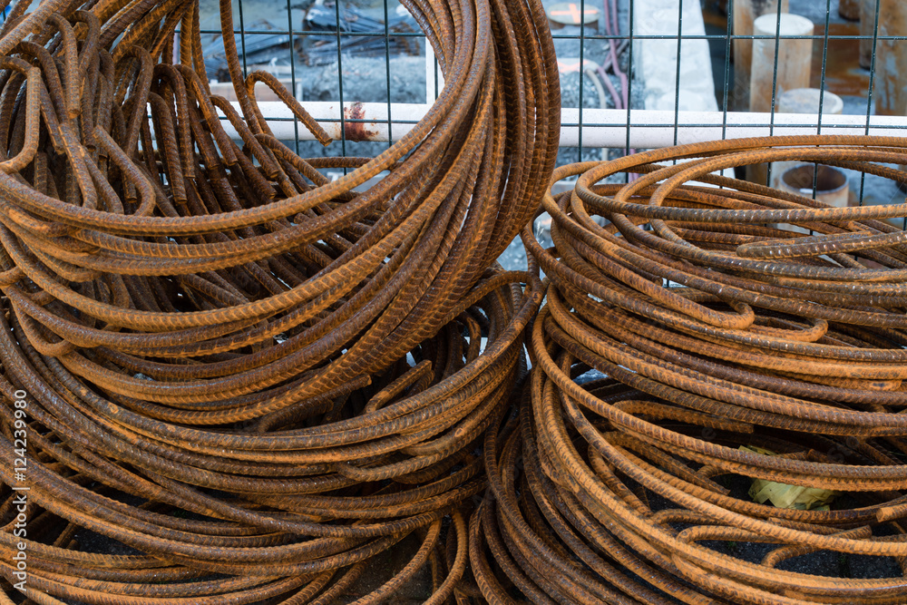 Reinforcement bars (rebar) bend into circular structures stacked nicely ...