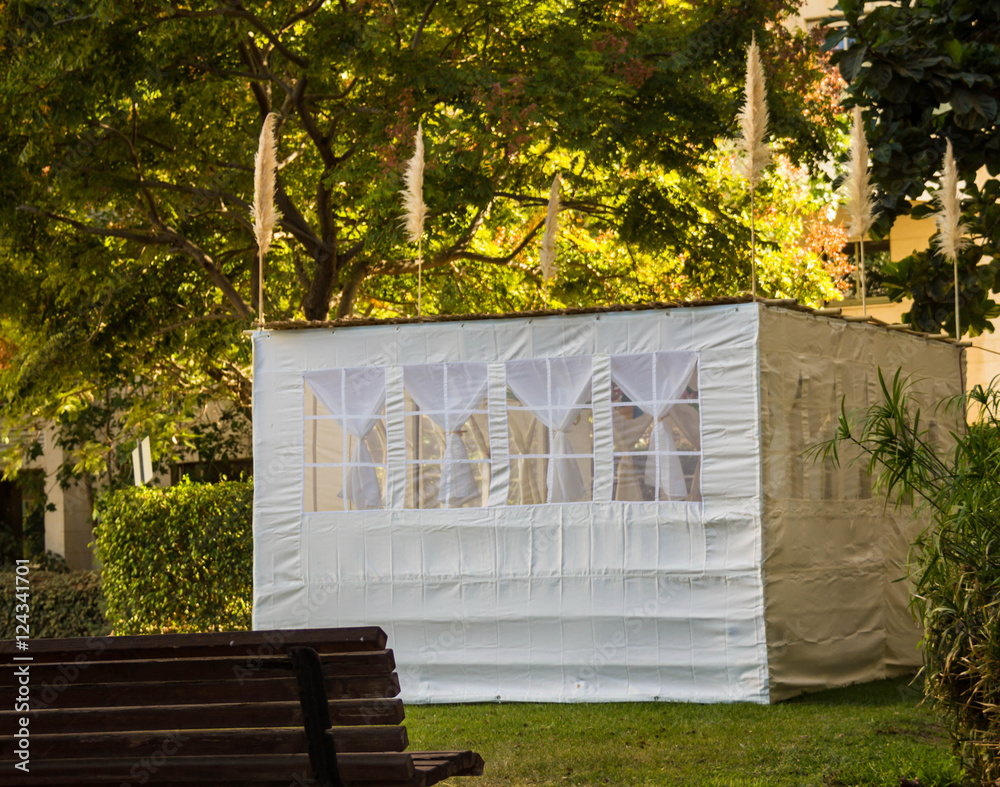 Fotografie Jewish Holiday Sukkot . A sukkah is a temporary hut ...