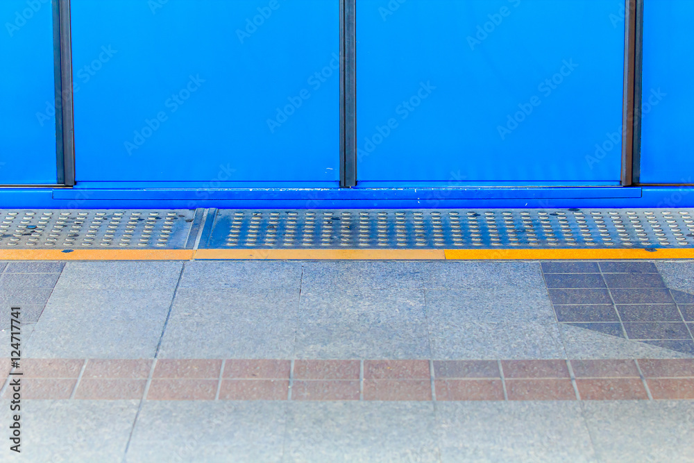 closed sliding mechanical door of a Bangkok Skytrain at a BTS train ...