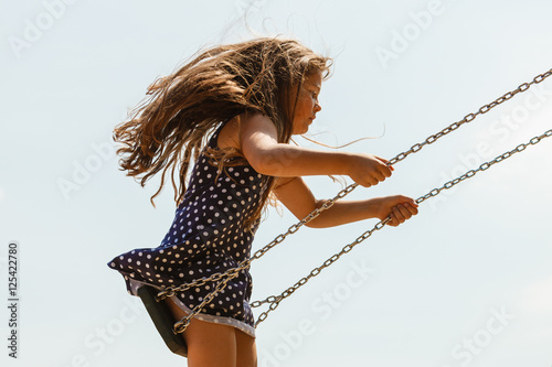 Girl Swinging On Swing Set Comprar Esta Foto De Stock Y Explorar