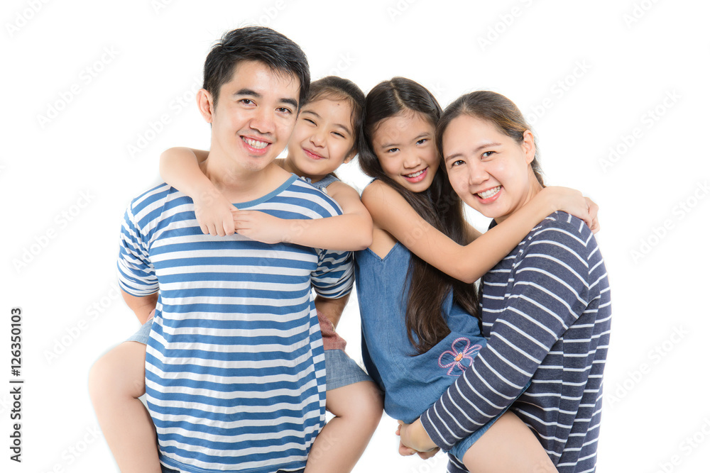 Happy Asian family smiling and lying on isolated white background ...